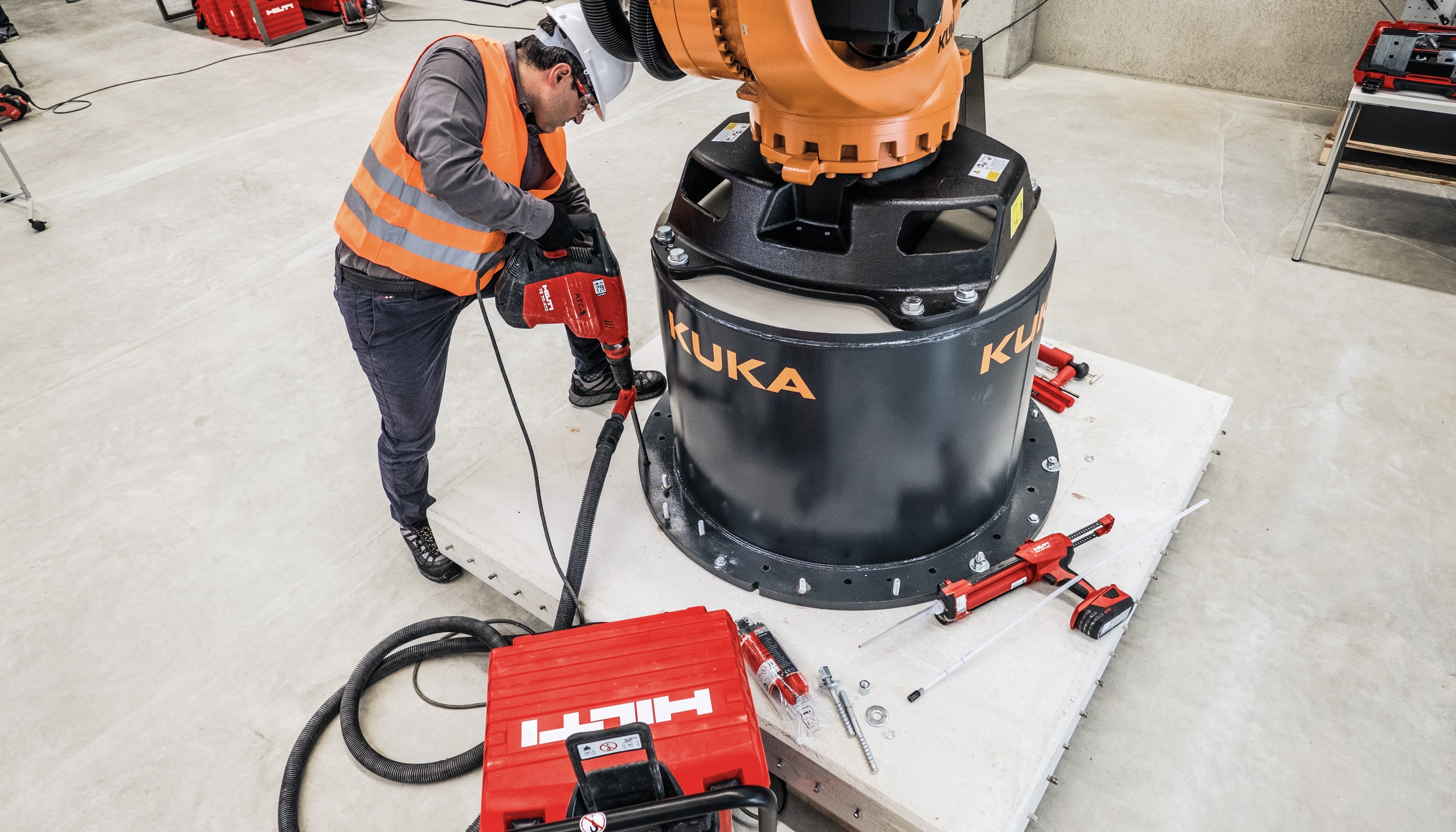 Fastening equipment to concrete